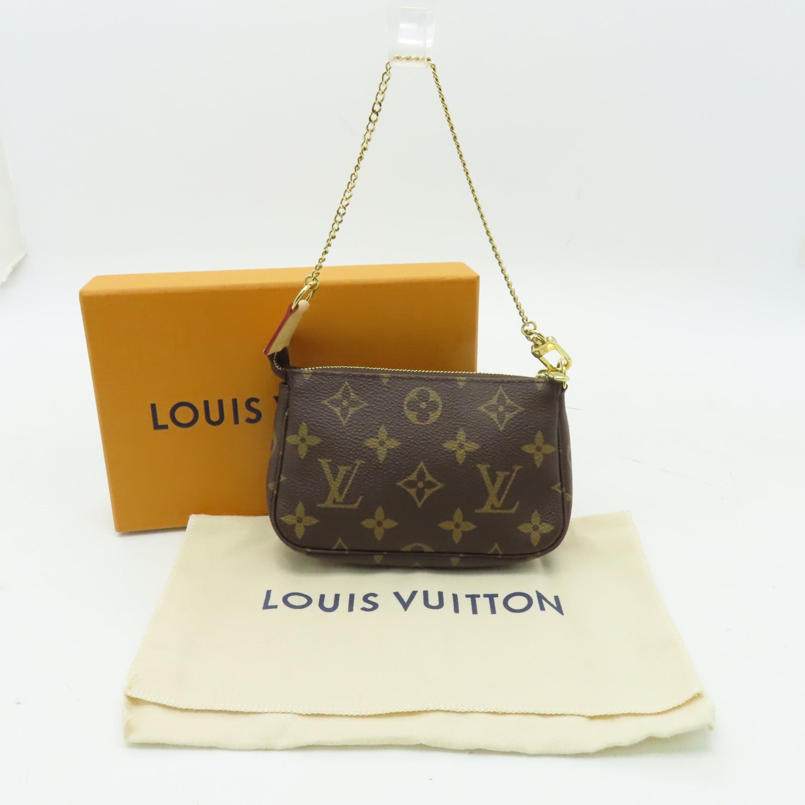 LOUIS VUITTON Monogram Mini Pochette Accessoires金扣手挽袋啡色 – Brand Off ...